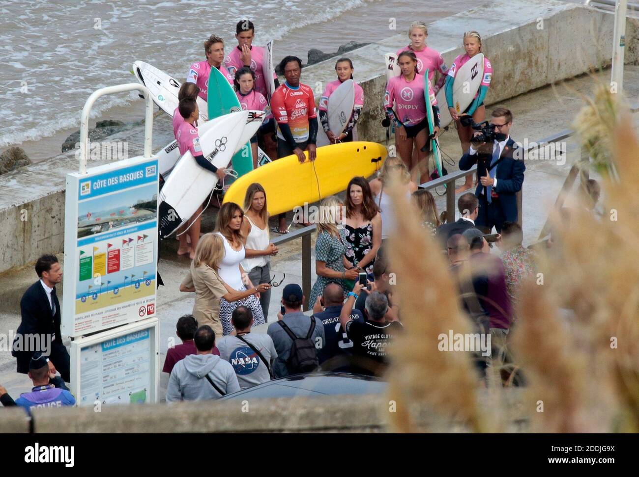 Brigitte Macron, Melania Trump and other leaders’ spouses watch a surf ...