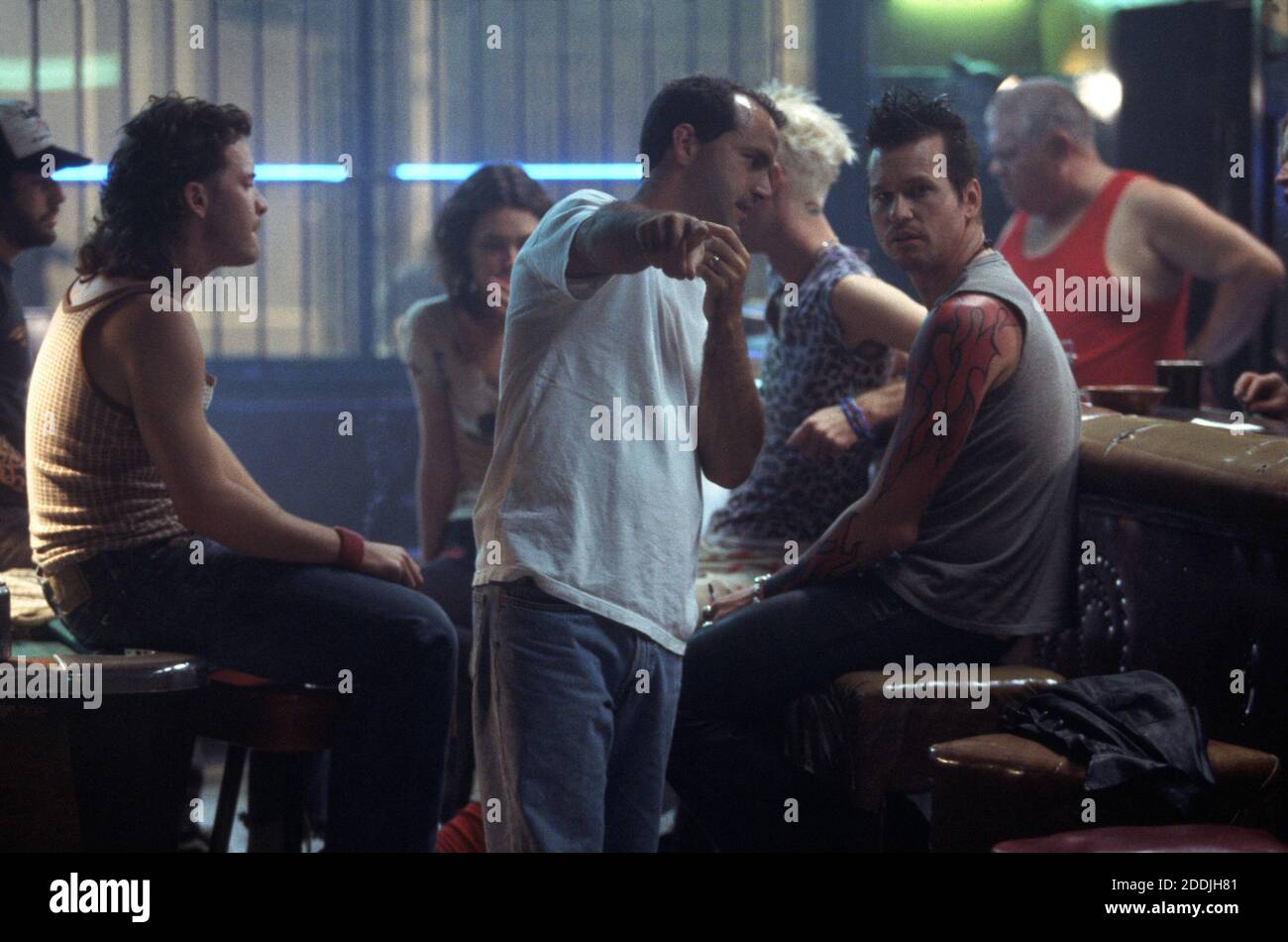 Director DJ Caruso (center) goes over the scene at the Cinder Block Bar ...