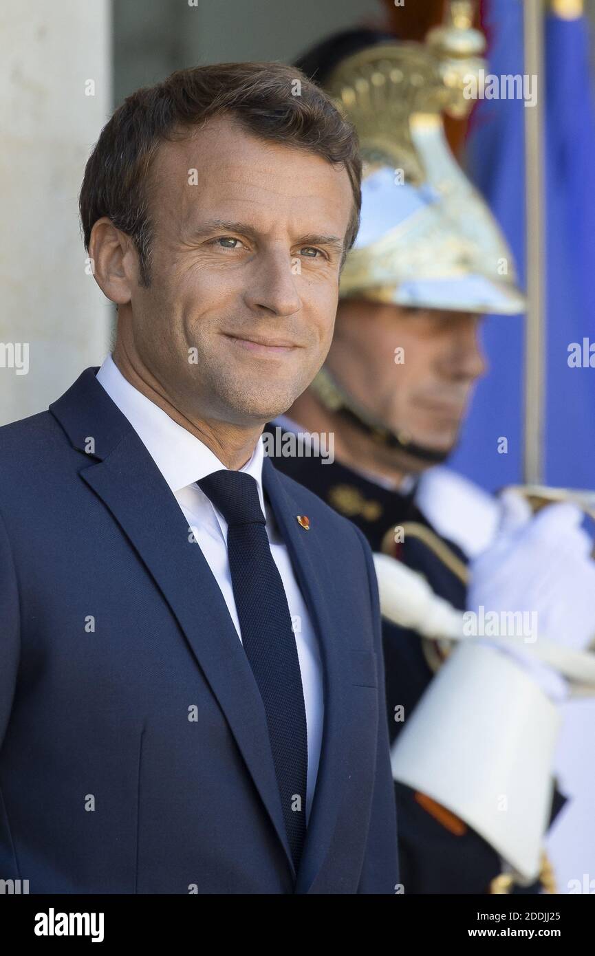 French President Emmanuel Macron gestures at Elysee palace in Paris ...
