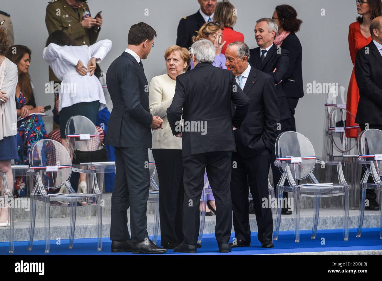 Germany's Chancellor Angela Merkel attends the Bastille Day military ...