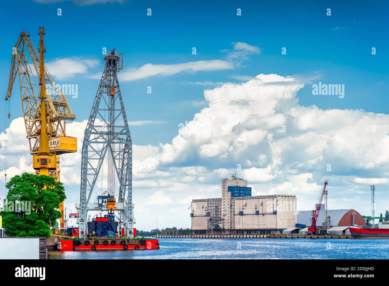 Dredging platform in industrial port and harbour in Szczecin with tall ...