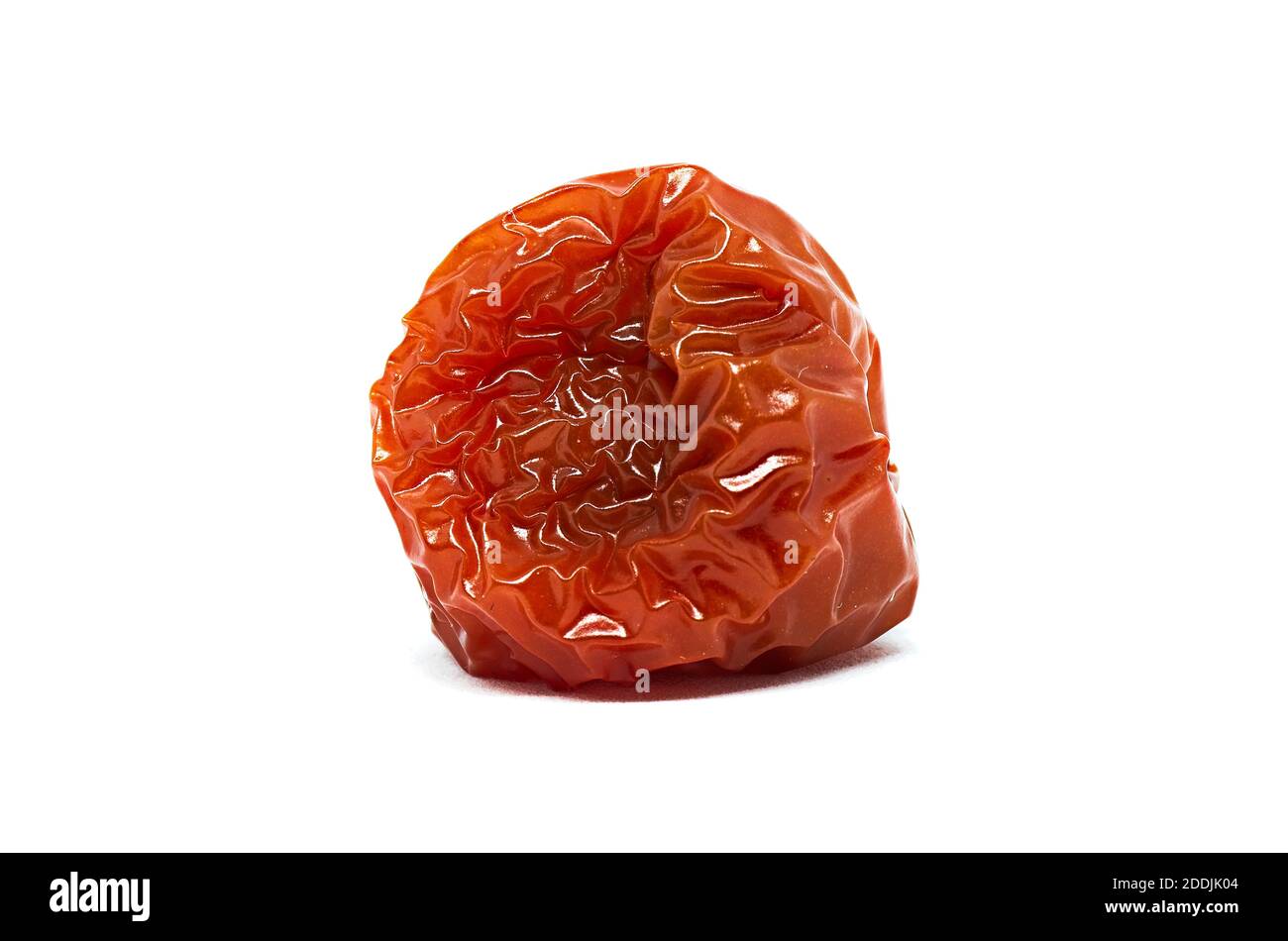 Rotten red cherry tomato on whote background. Studio shot of a ...