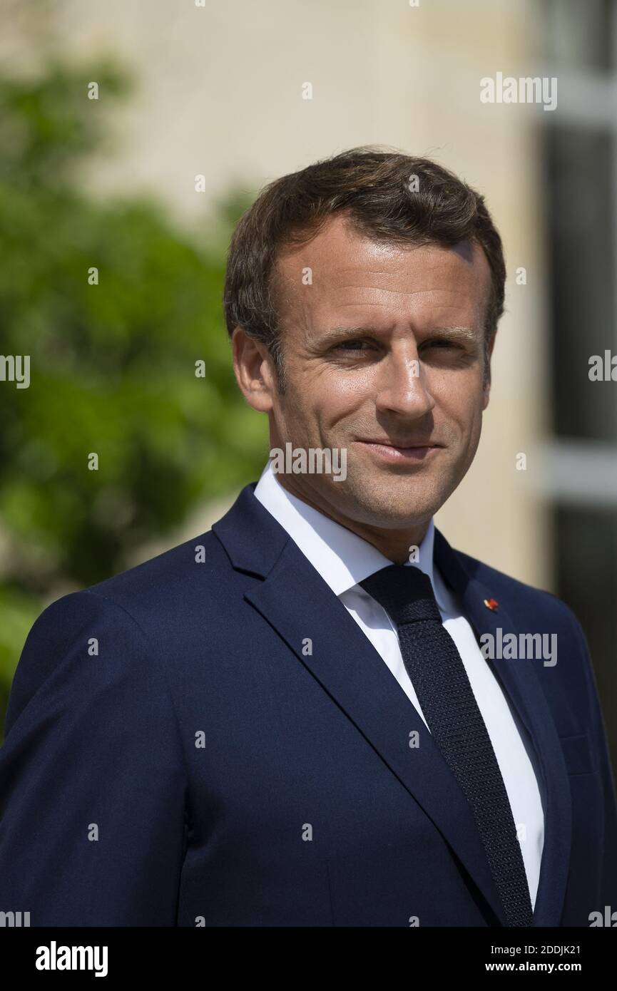 French President Emmanuel Macron gestures at Elysee palace in Paris ...