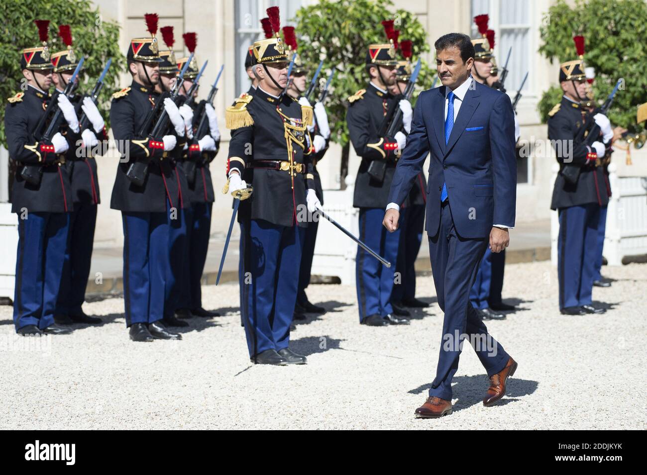 Qatar's Emir Tamim bin Hamad Al-Thani arrives at the Elysee palace on ...