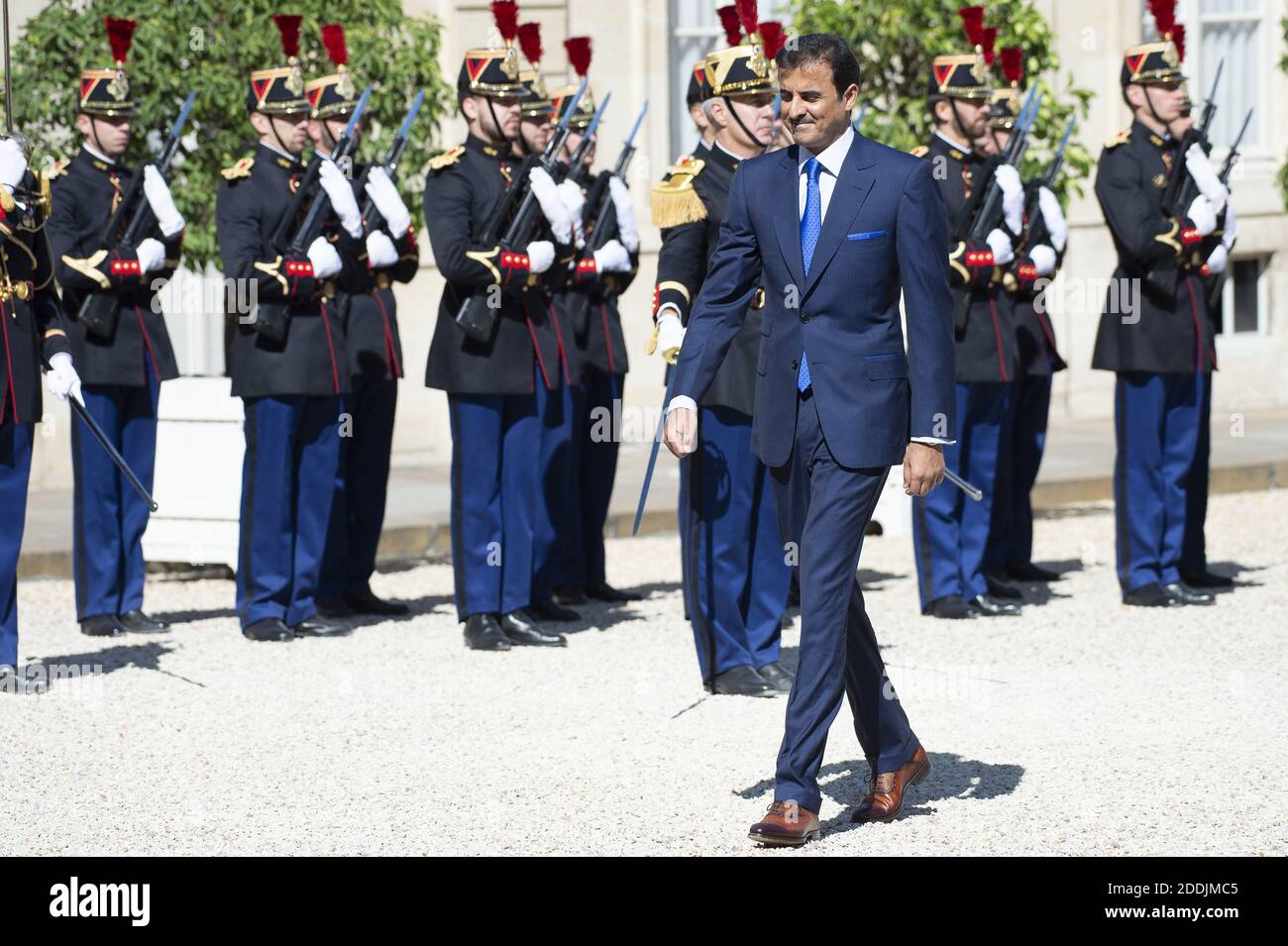 Qatar's Emir Tamim bin Hamad Al-Thani arrives at the Elysee palace on ...