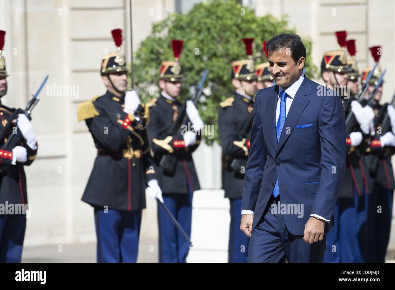 Qatar's Emir Tamim bin Hamad Al-Thani arrives at the Elysee palace on ...