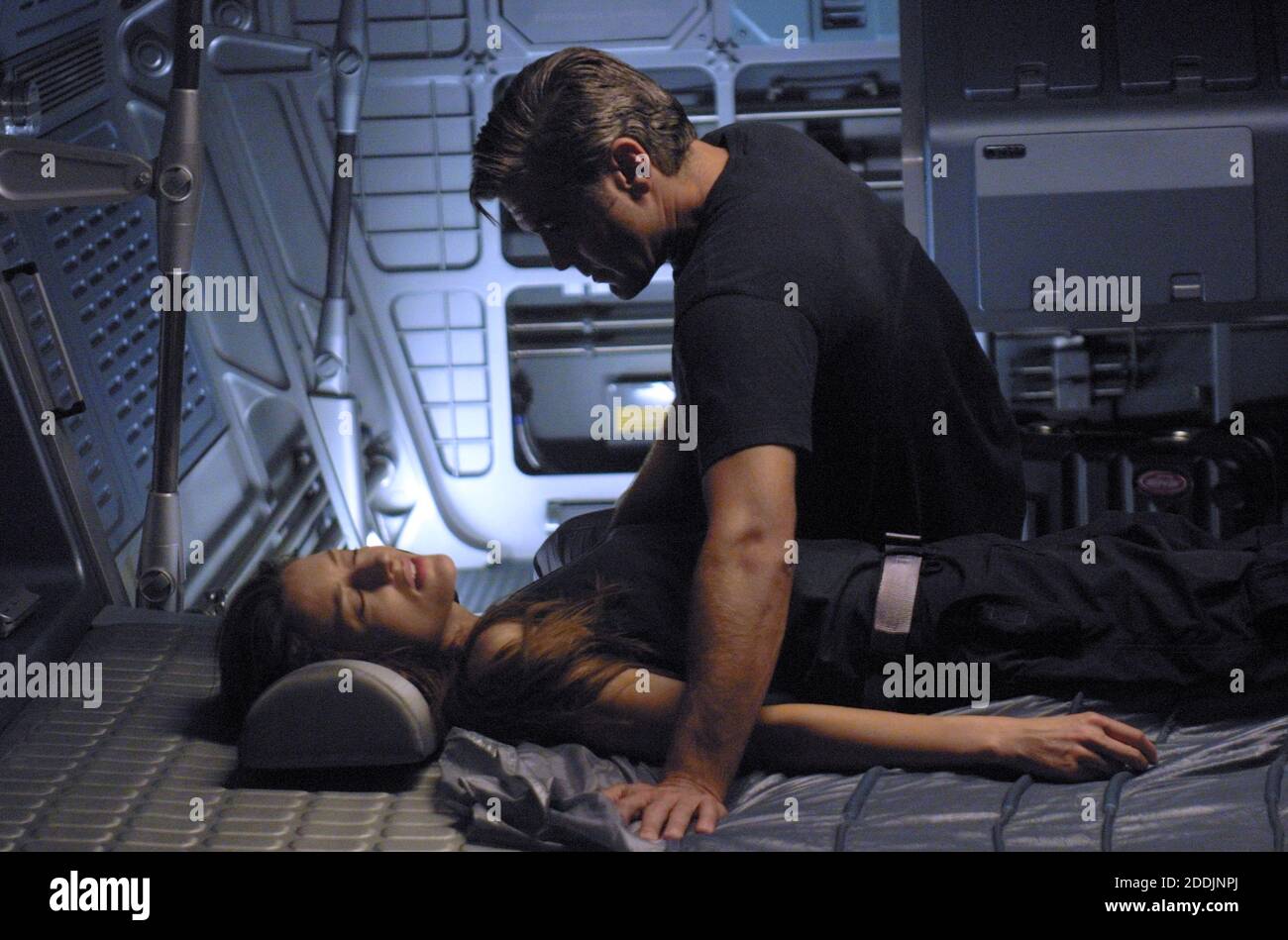 Chris Kelvin (George Clooney) ponders the shocking appearance of his ...