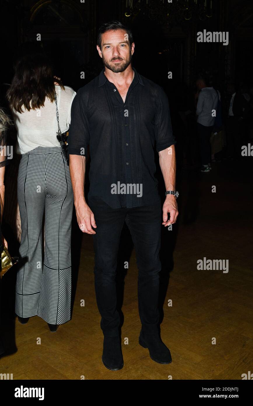 Ian Bohen poses before the Viktor and Rolf Haute Couture Fall/Winter ...