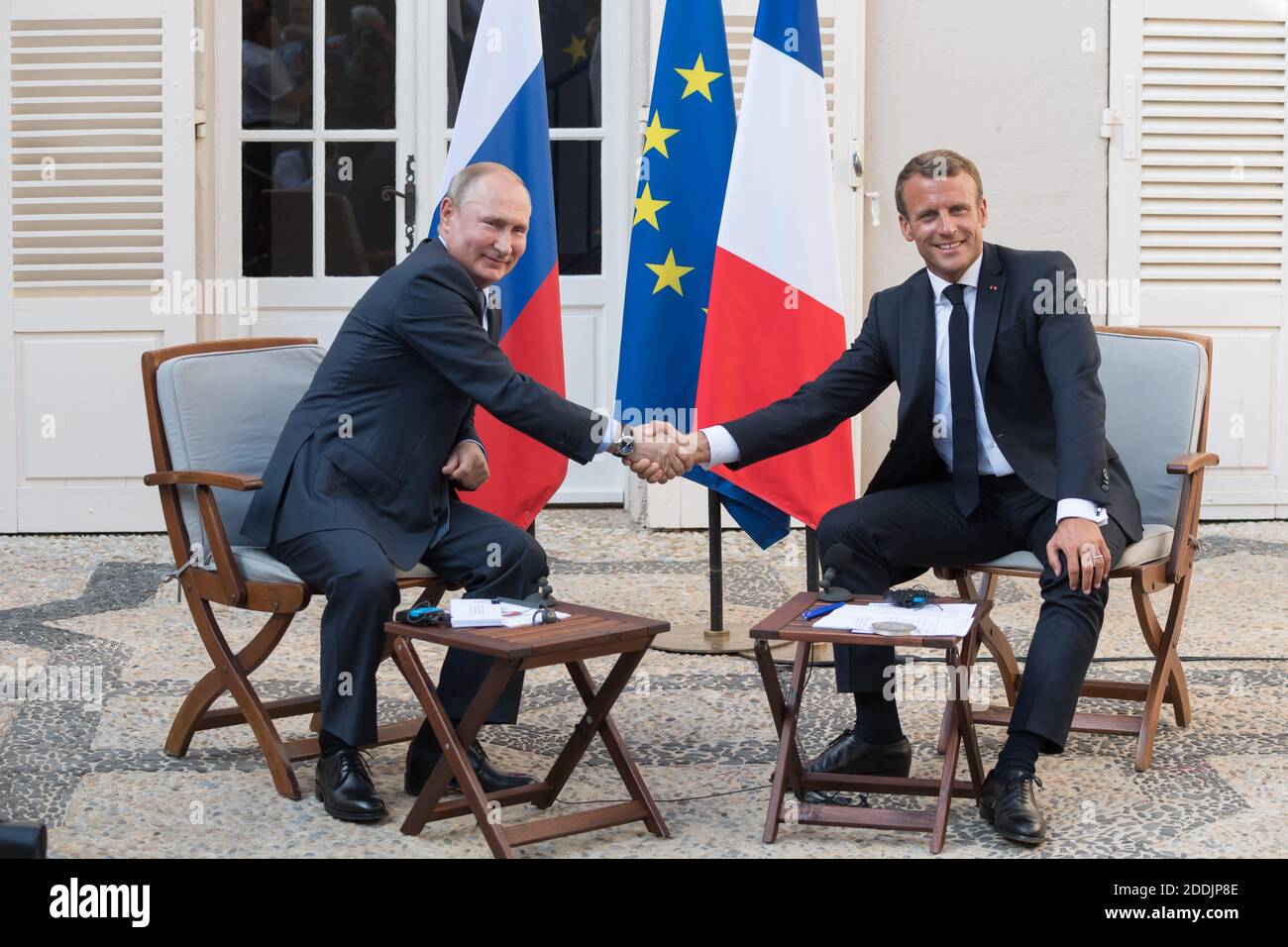 Russian President Vladimir Putin and French President Emmanuel Macron ...