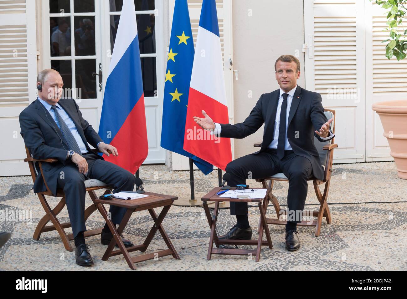 Russian President Vladimir Putin and French President Emmanuel Macron ...
