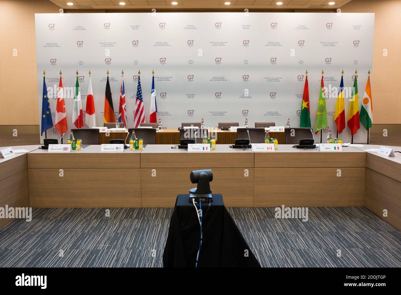 Empty room of reunion of the G7 conference. French minister Jean-Yves ...
