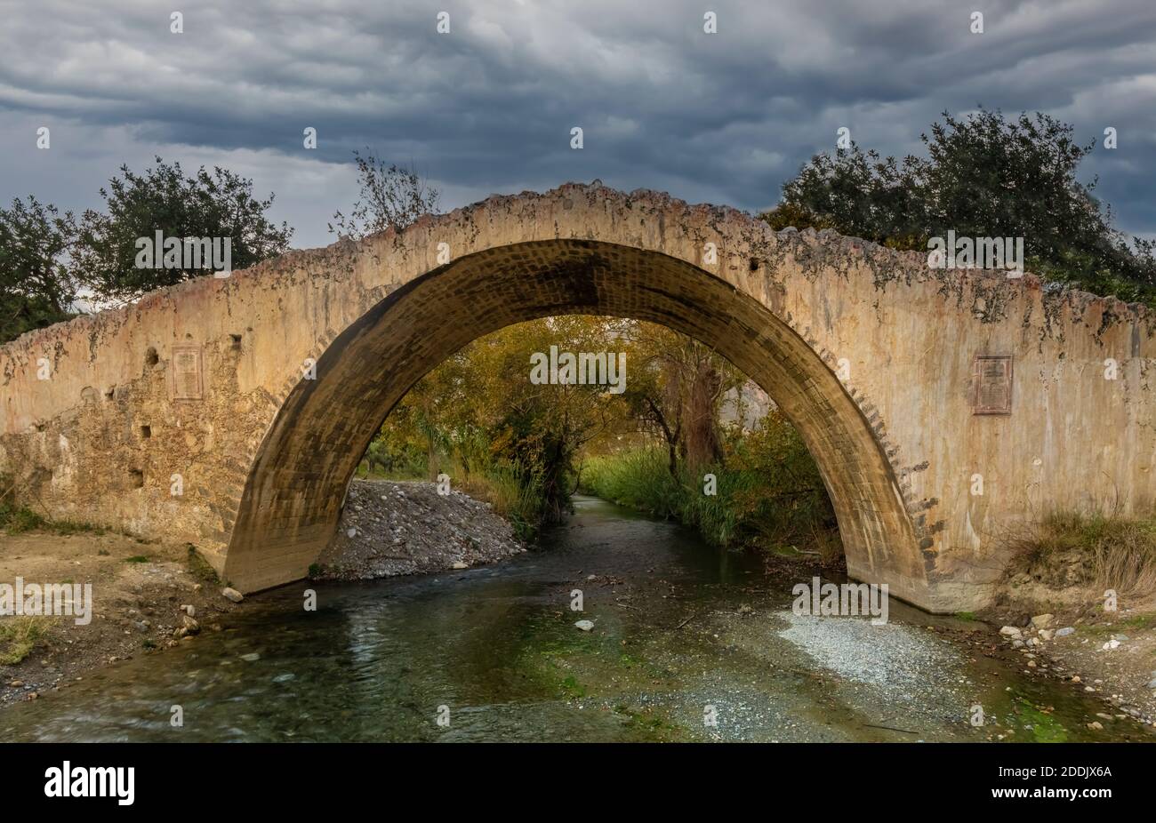 The beautiful arched bridge of Prevelis crossing the Megas River which ...