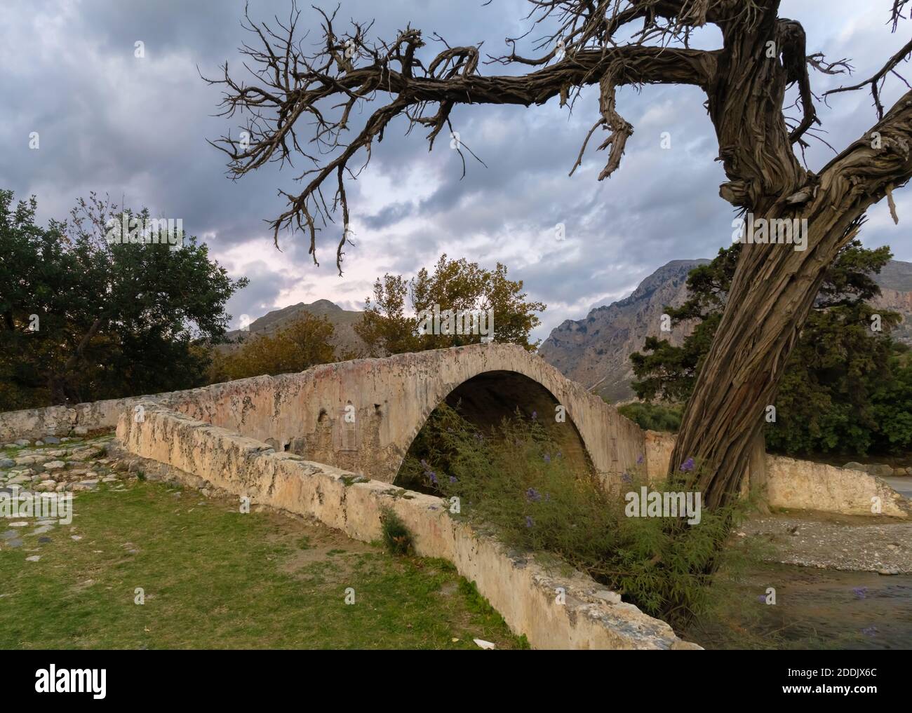 The beautiful arched bridge of Prevelis crossing the Megas River which ...