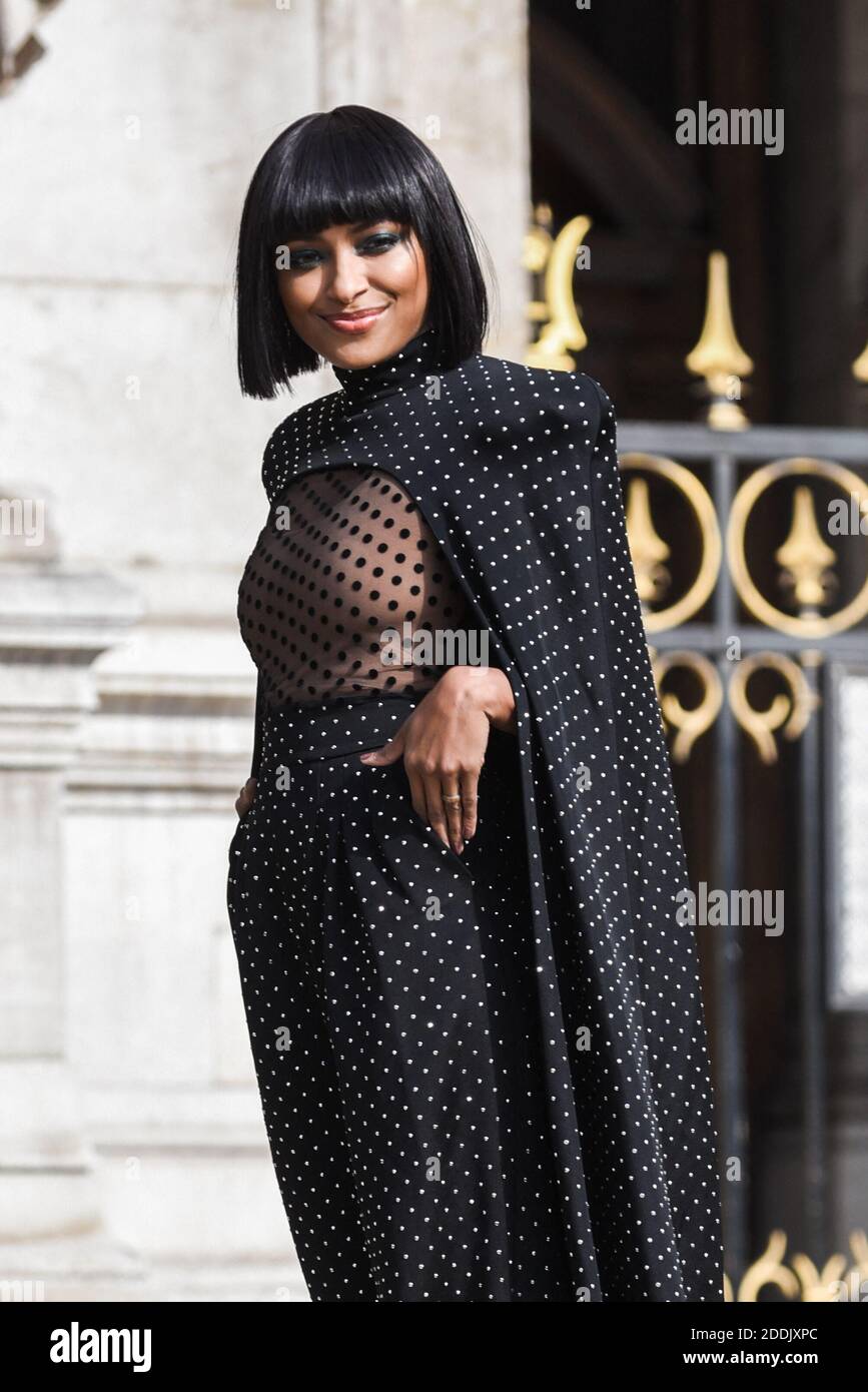 Kat Graham poses before the runway during the Balmain Womenswear Spring ...
