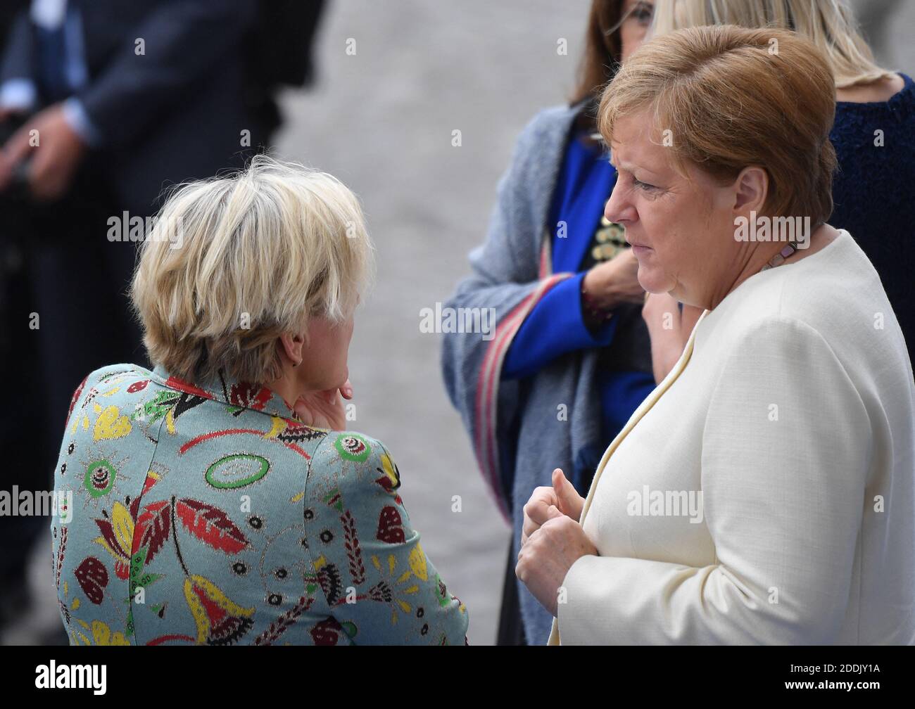 German Chancellor Angela Merkel attend the Bastille Day military parade ...