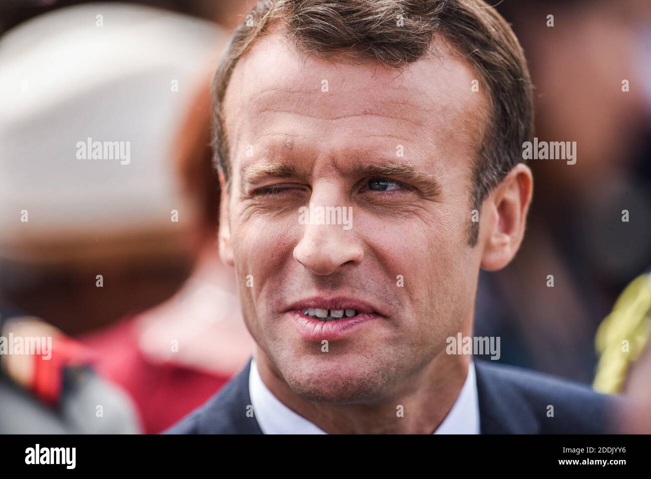 French president Emmanuel Macron blinks an eye during the Bastille Day ...
