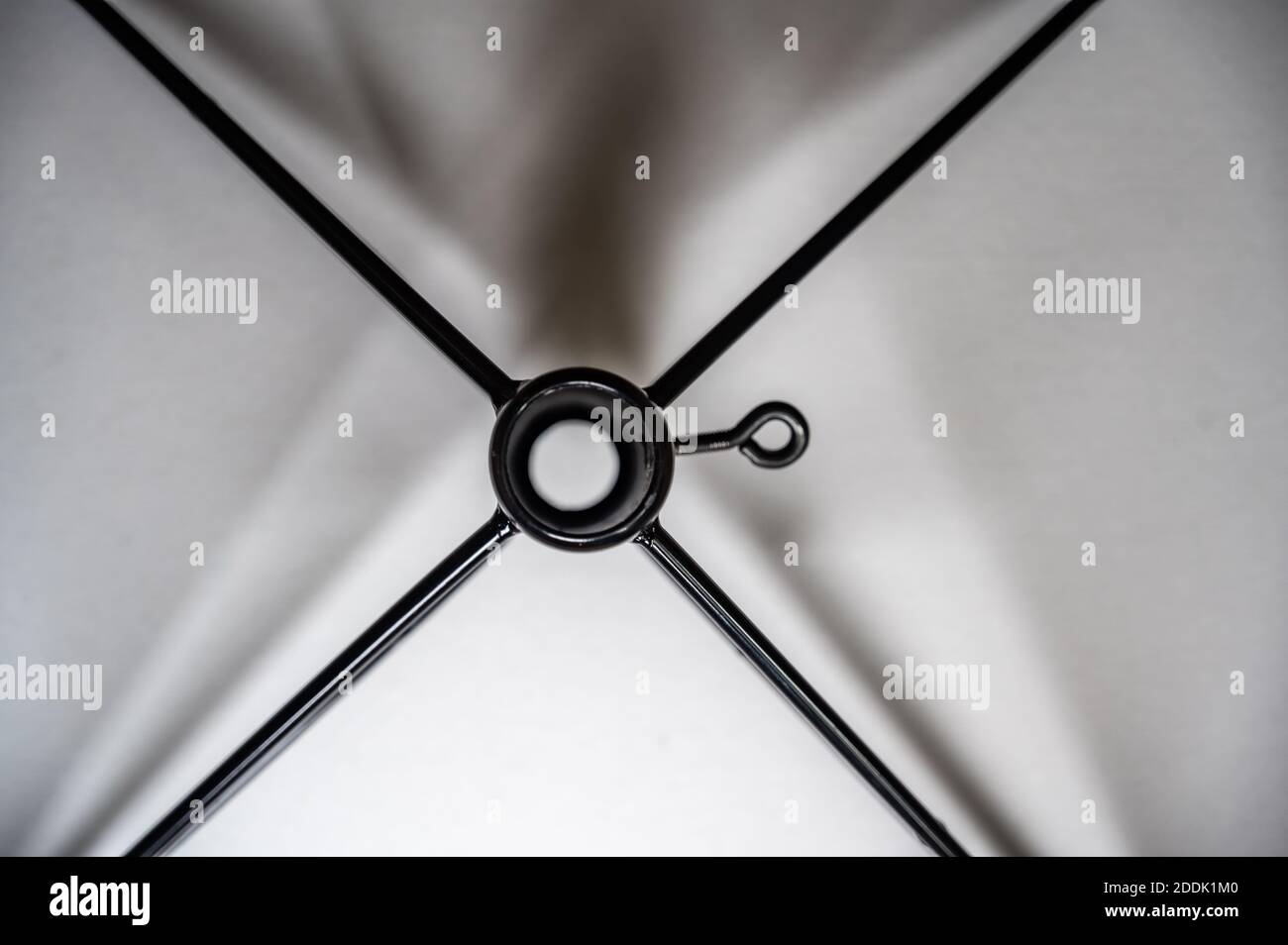 Metal support with tension screw to hold tree in place Stock Photo - Alamy