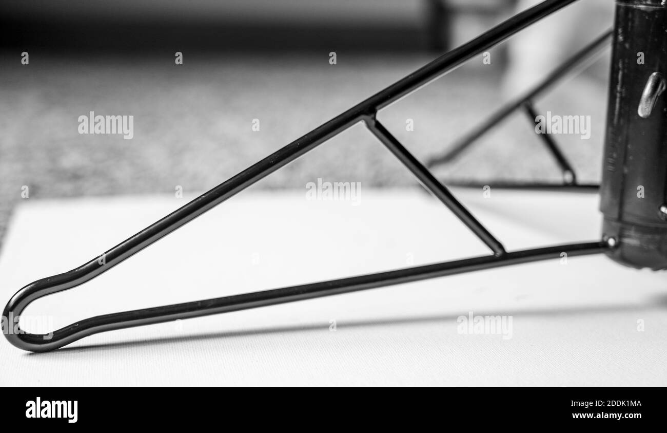 Metal support with tension screw to hold tree in place Stock Photo - Alamy