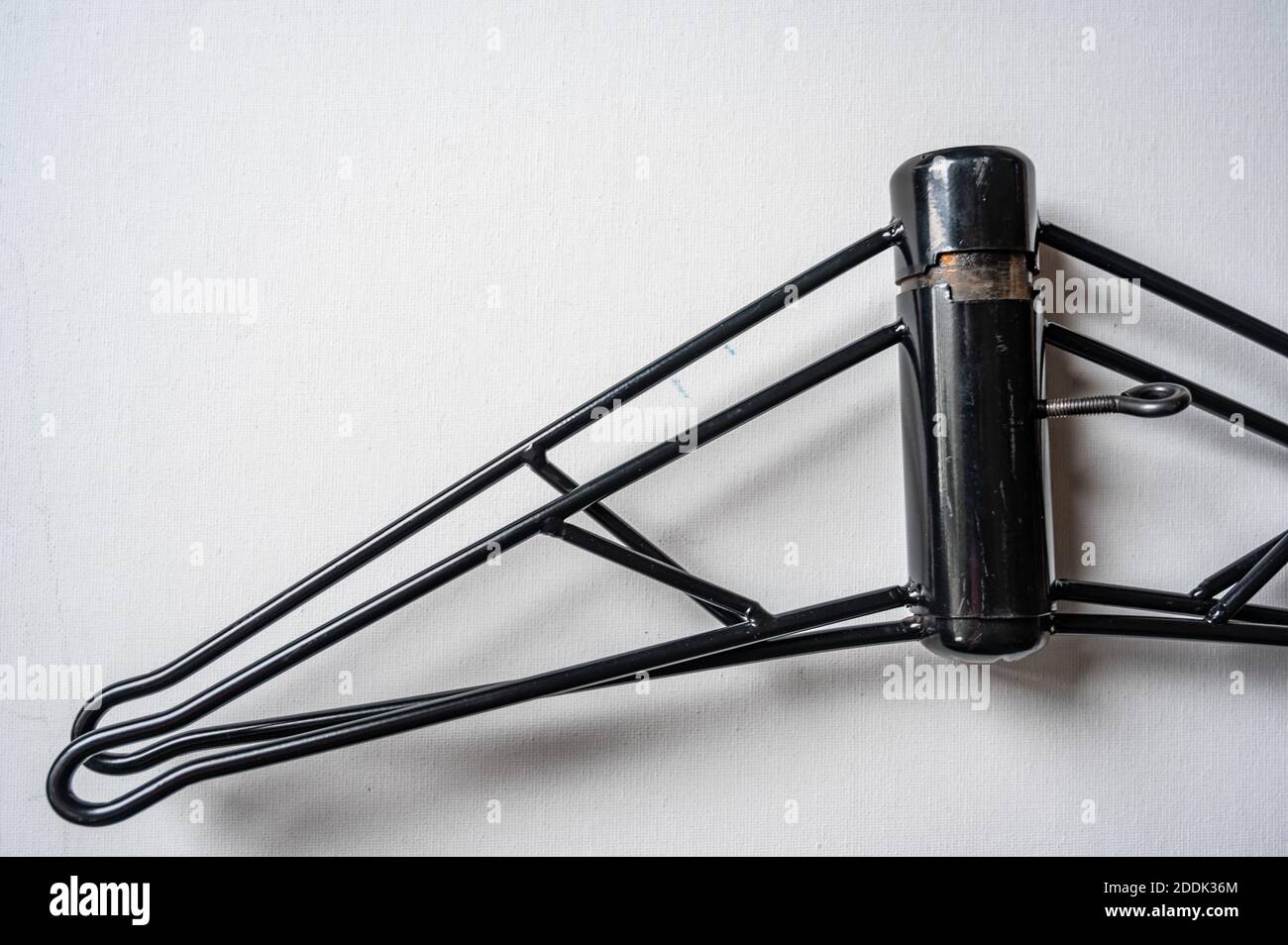 Metal support with tension screw to hold tree in place Stock Photo - Alamy