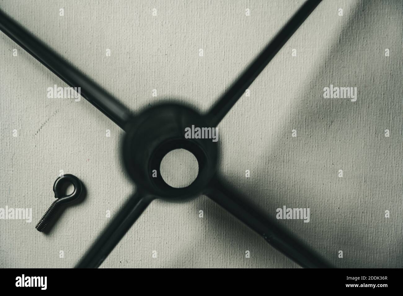 Metal support with tension screw to hold tree in place Stock Photo - Alamy