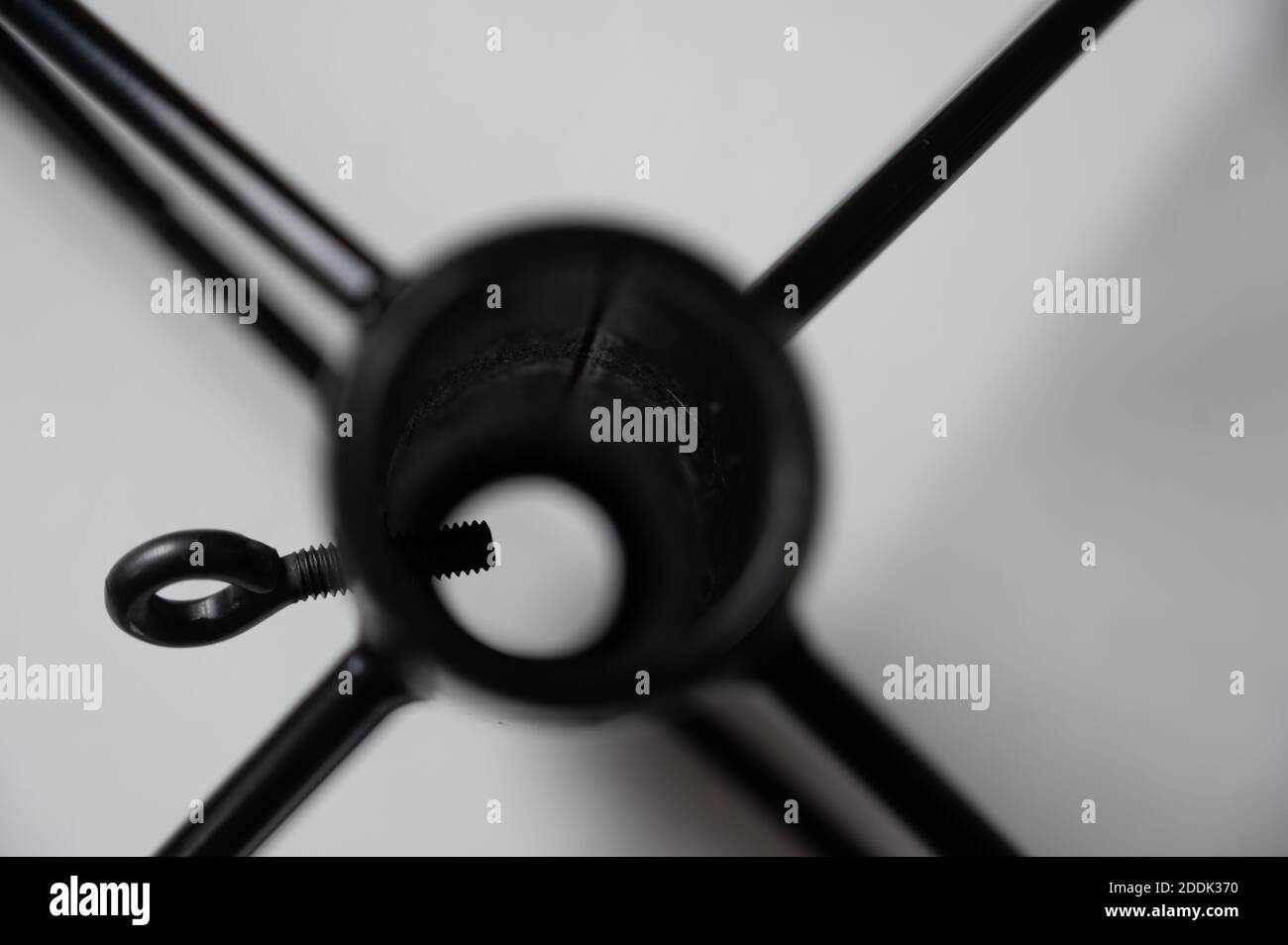 Metal support with tension screw to hold tree in place Stock Photo - Alamy