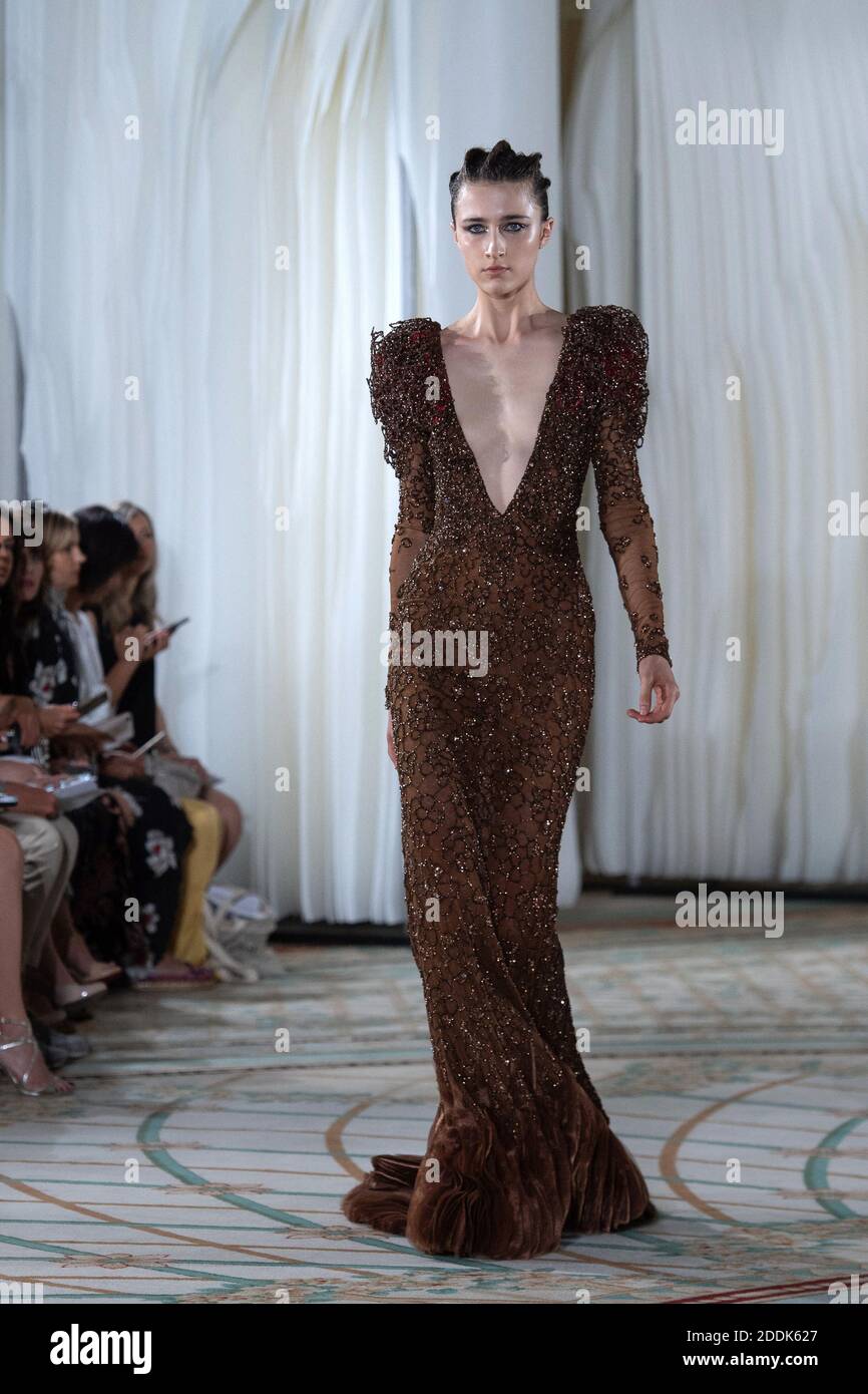 A model walks the runway during the Tony Ward show as part Paris Haute ...