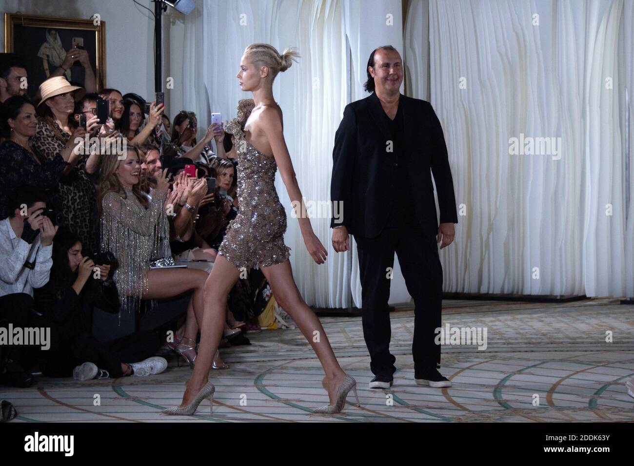 Designer Tony Ward makes an appearance on the runway during the Tony ...