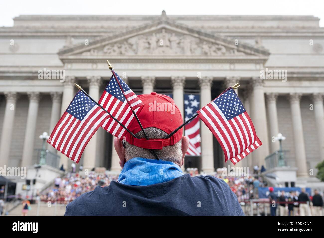 Parade-goers line up for the Independence Day Parade along Constitution ...