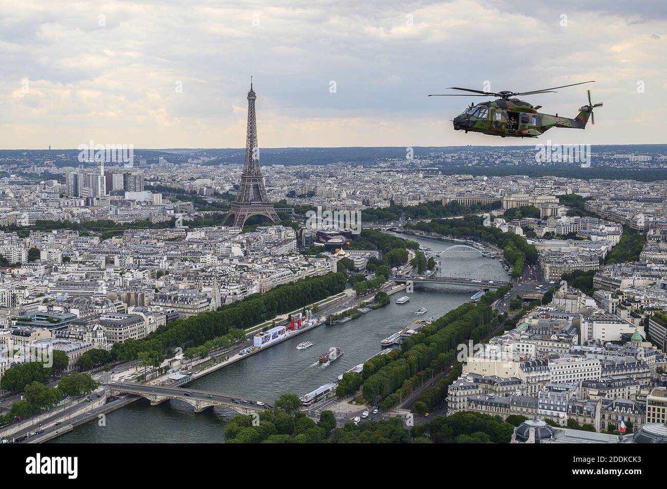 A picture taken on July 11, 2019 over Paris, France, shows a NH90 ...