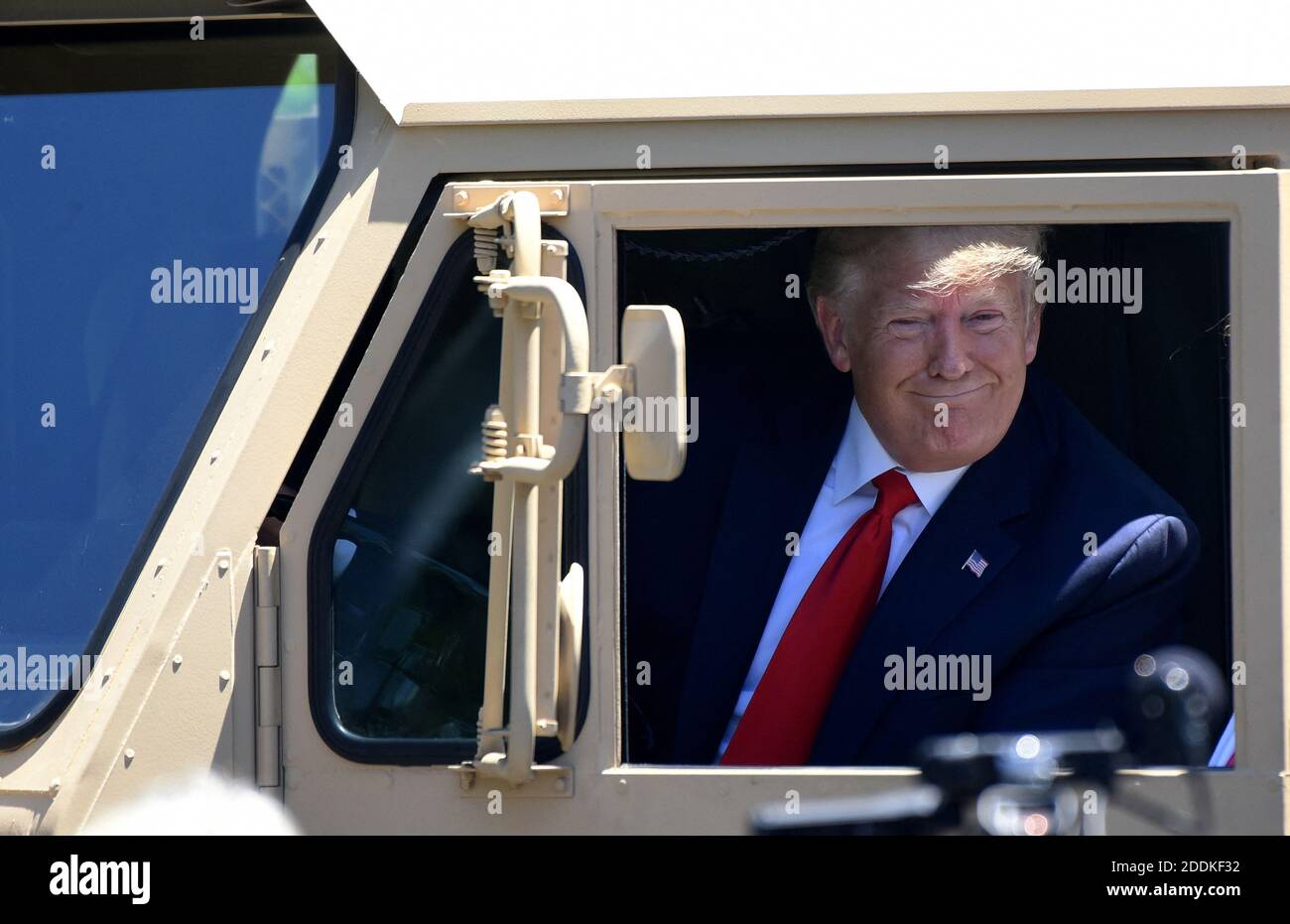 US President Donald Trump sits in a THAAD missile launcher by Lockheed ...