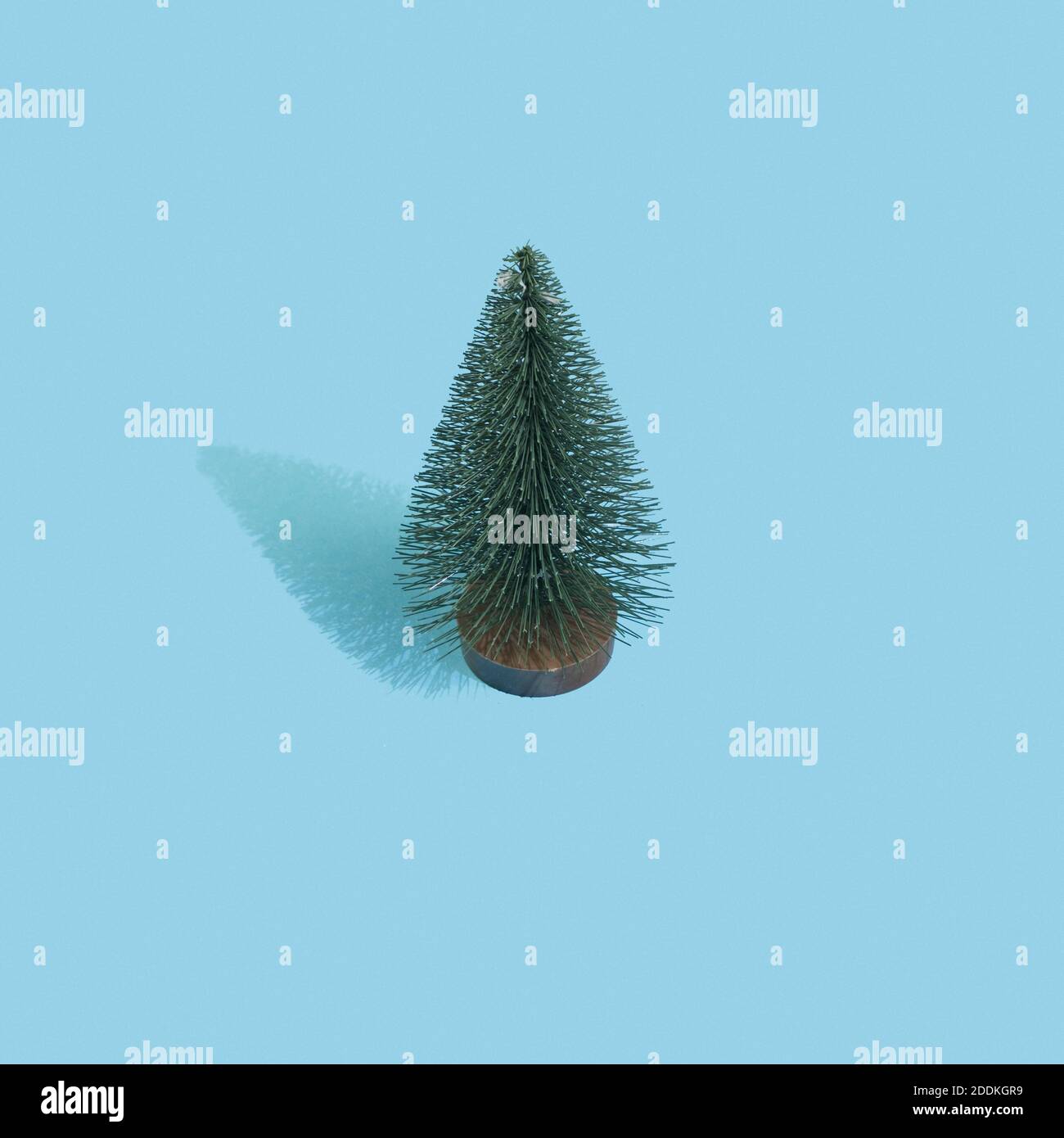 Christmas toy tree on pastel blue background. Minimal New year concept ...