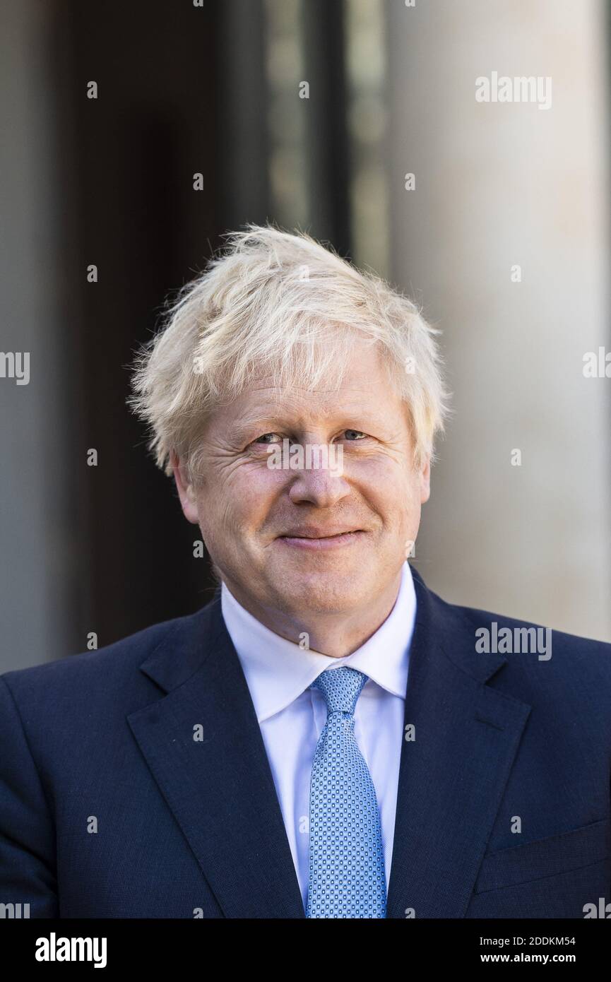 Britain's Prime Minister Boris Johnson gestures at The Elysee Palace in ...