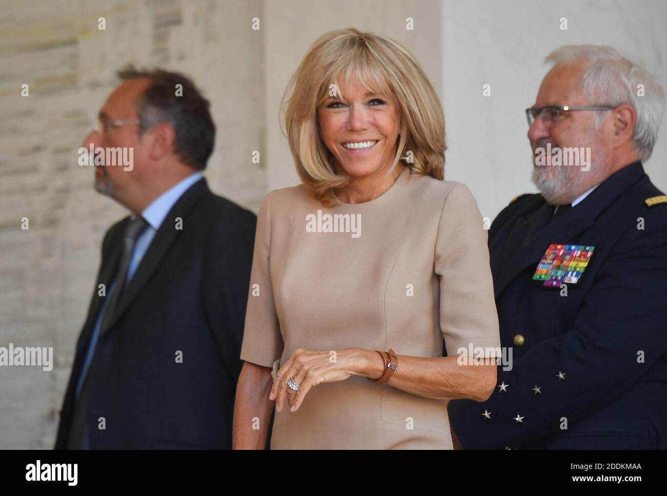 French President's wife Brigitte Macron looks on as Greek Prime ...