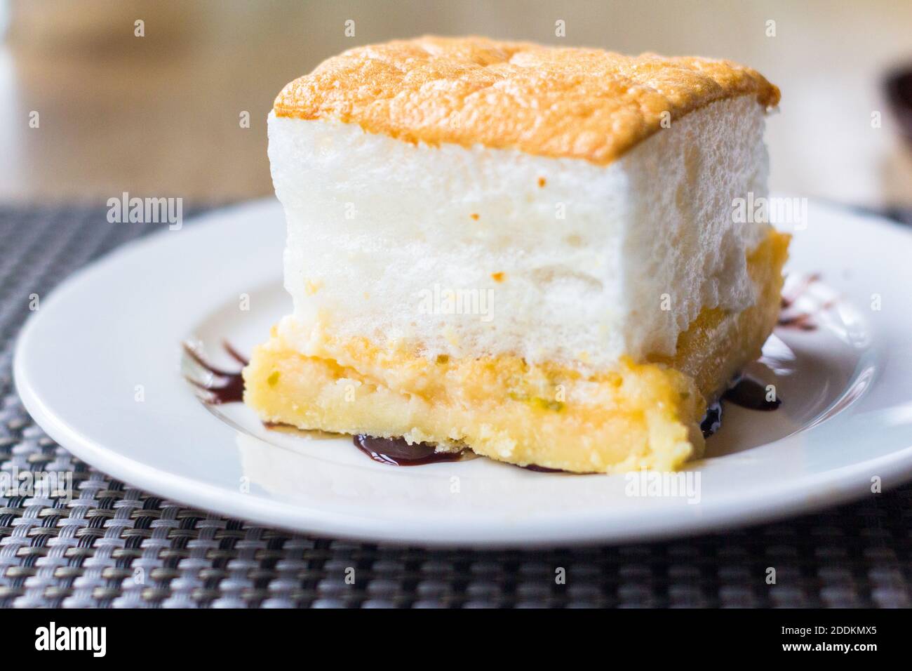 A slice of brazo de mercedes, a traditional Filipino dessert made of ...