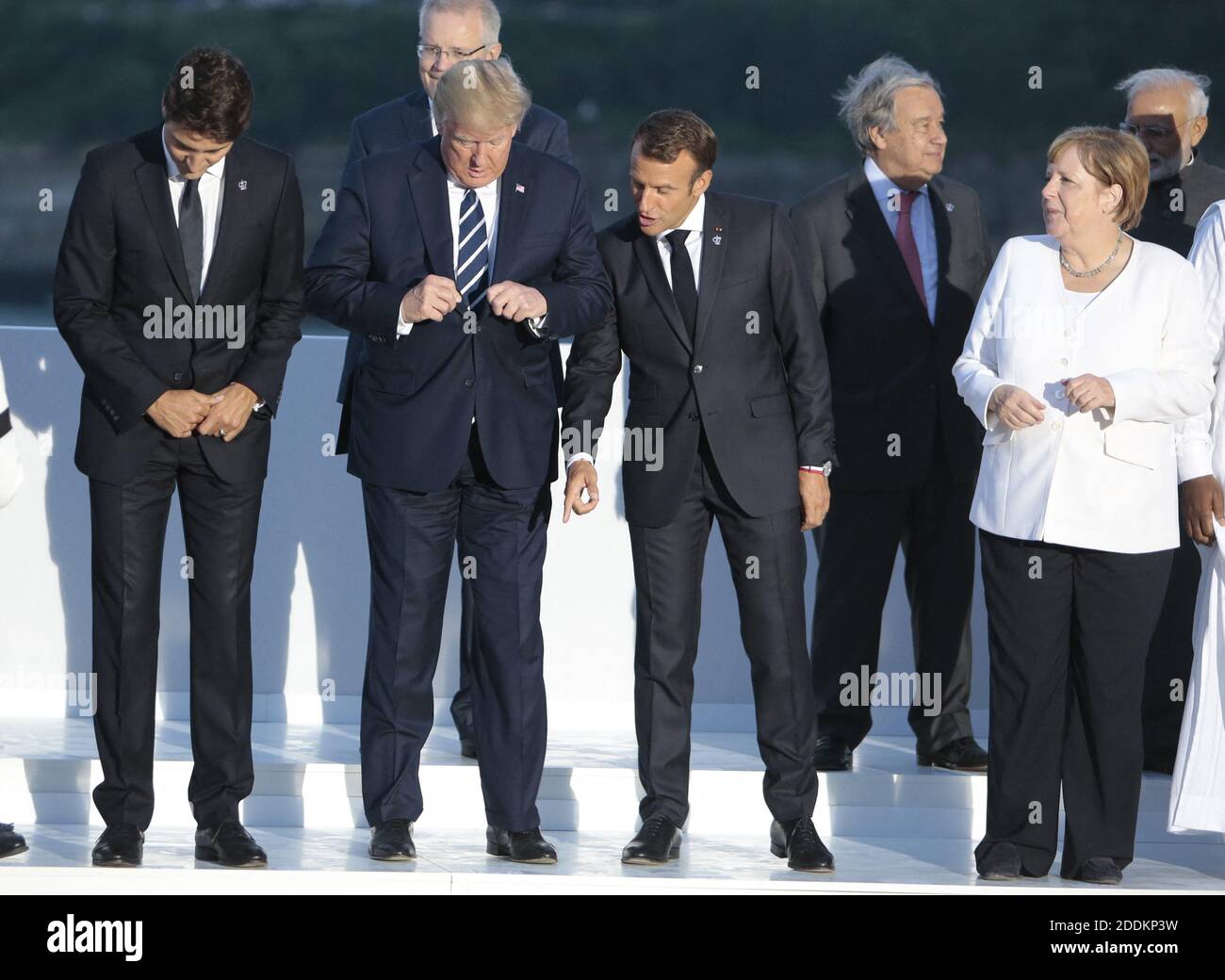 G7 leaders and guests pose for a family picture on the second day of ...