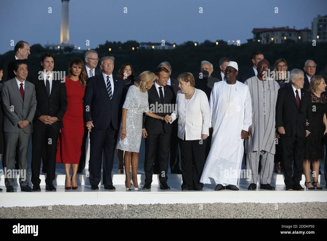 G7 leaders and guests pose for a family picture on the second day of ...