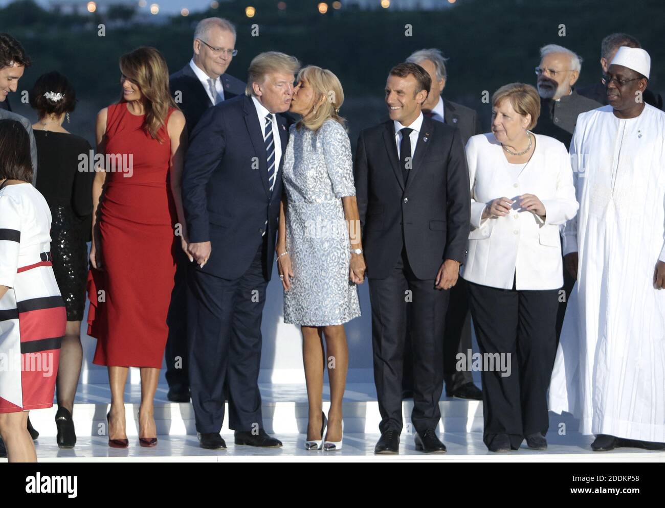 G7 leaders and guests pose for a family picture on the second day of ...