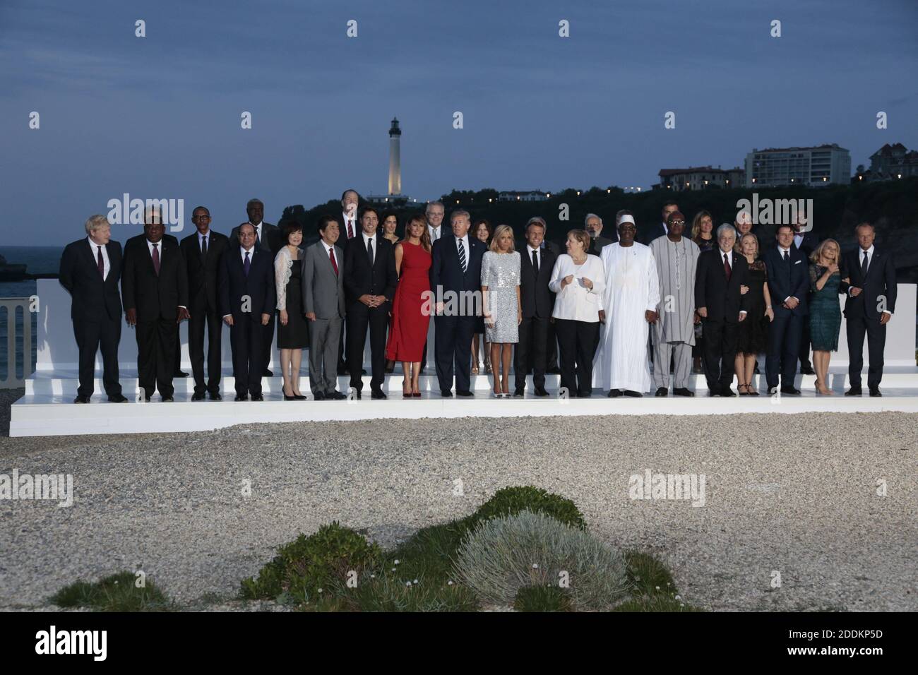 G7 leaders and guests pose for a family picture on the second day of ...