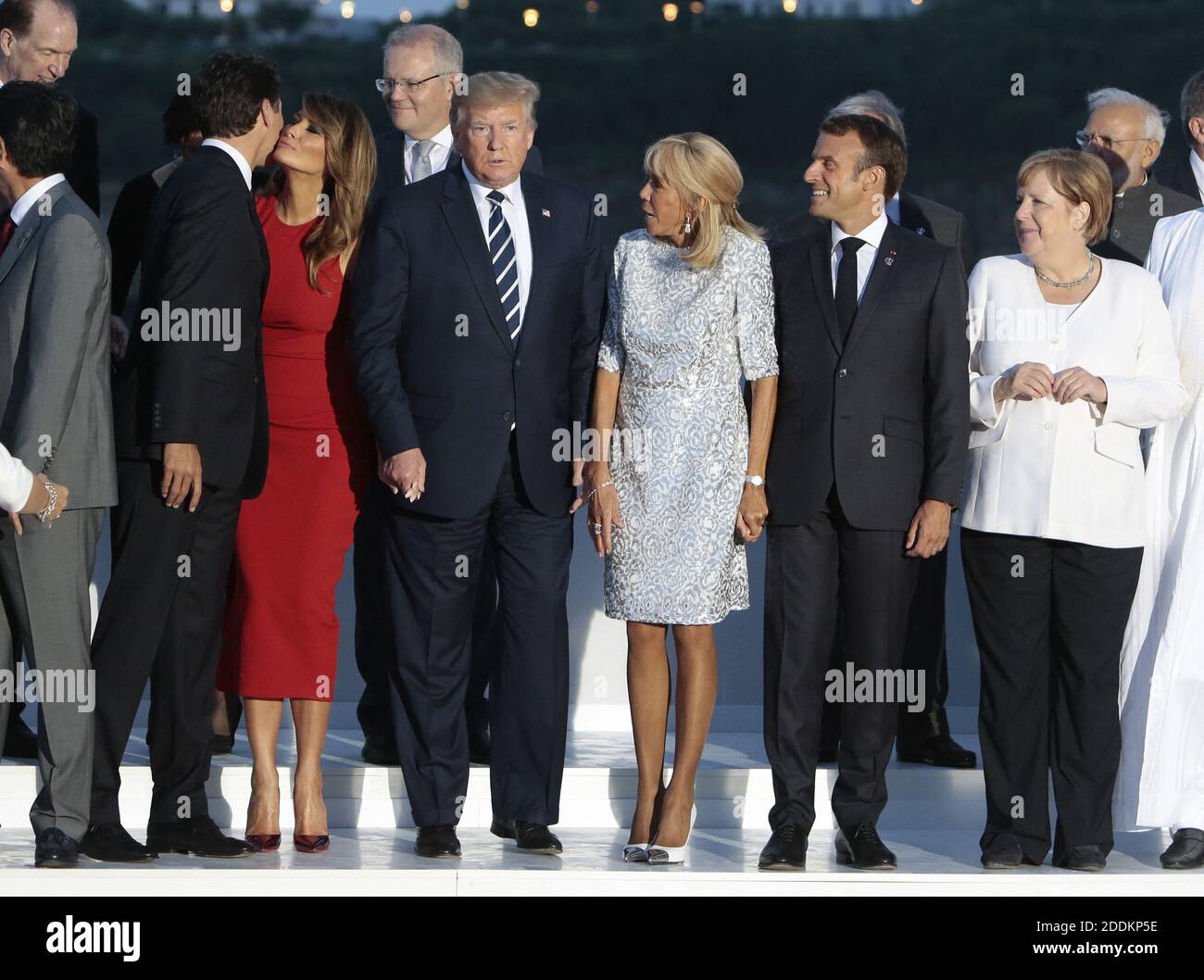 G7 leaders and guests pose for a family picture on the second day of ...