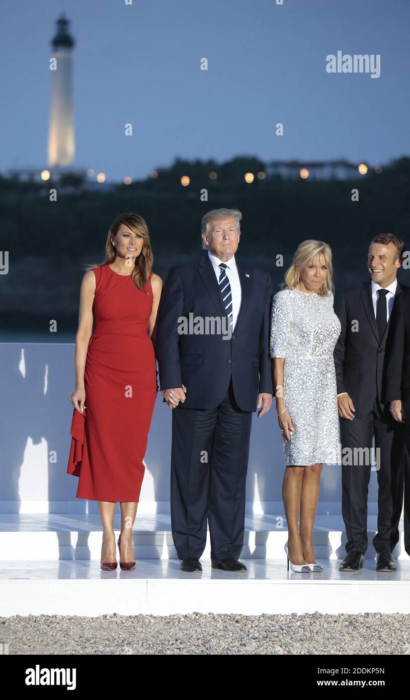G7 leaders and guests pose for a family picture on the second day of ...