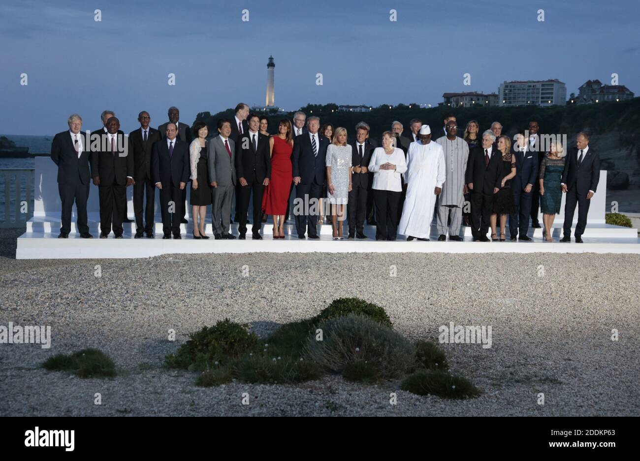 G7 leaders and guests pose for a family picture on the second day of ...