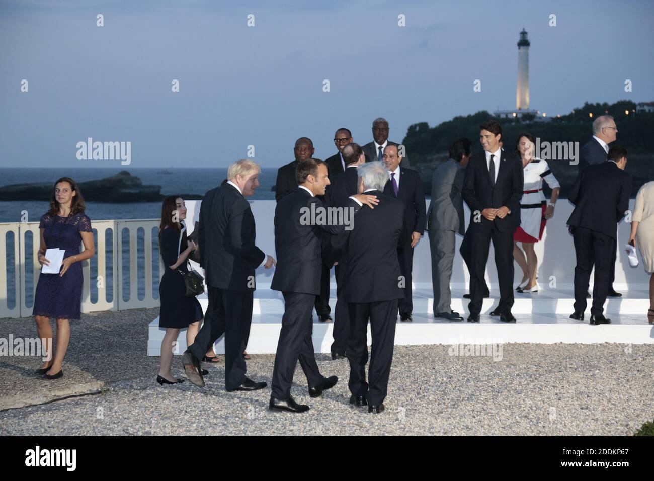G7 leaders and guests pose for a family picture on the second day of ...