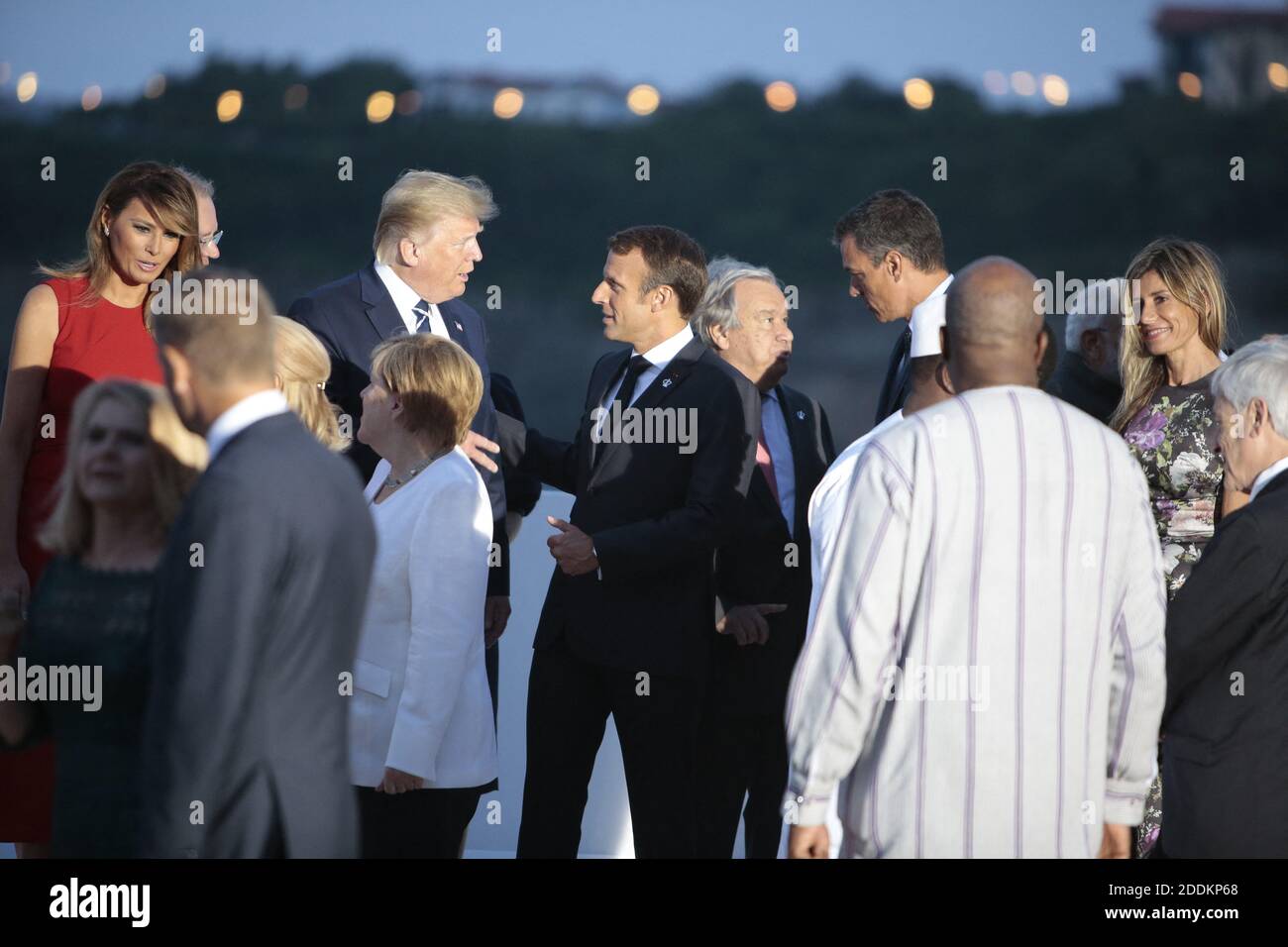 G7 leaders and guests pose for a family picture on the second day of ...