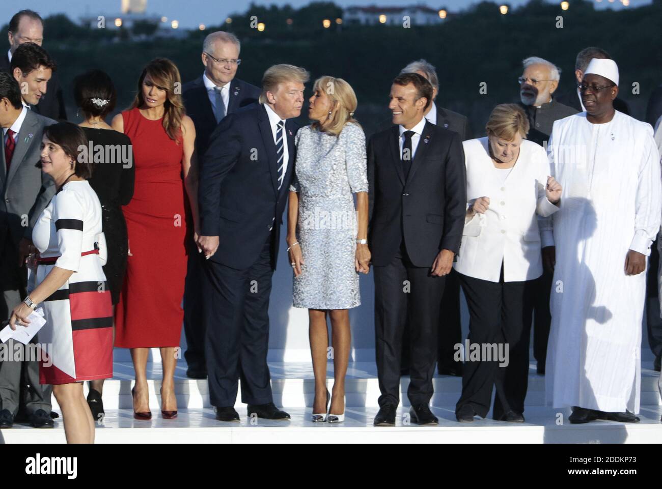 G7 leaders and guests pose for a family picture on the second day of ...