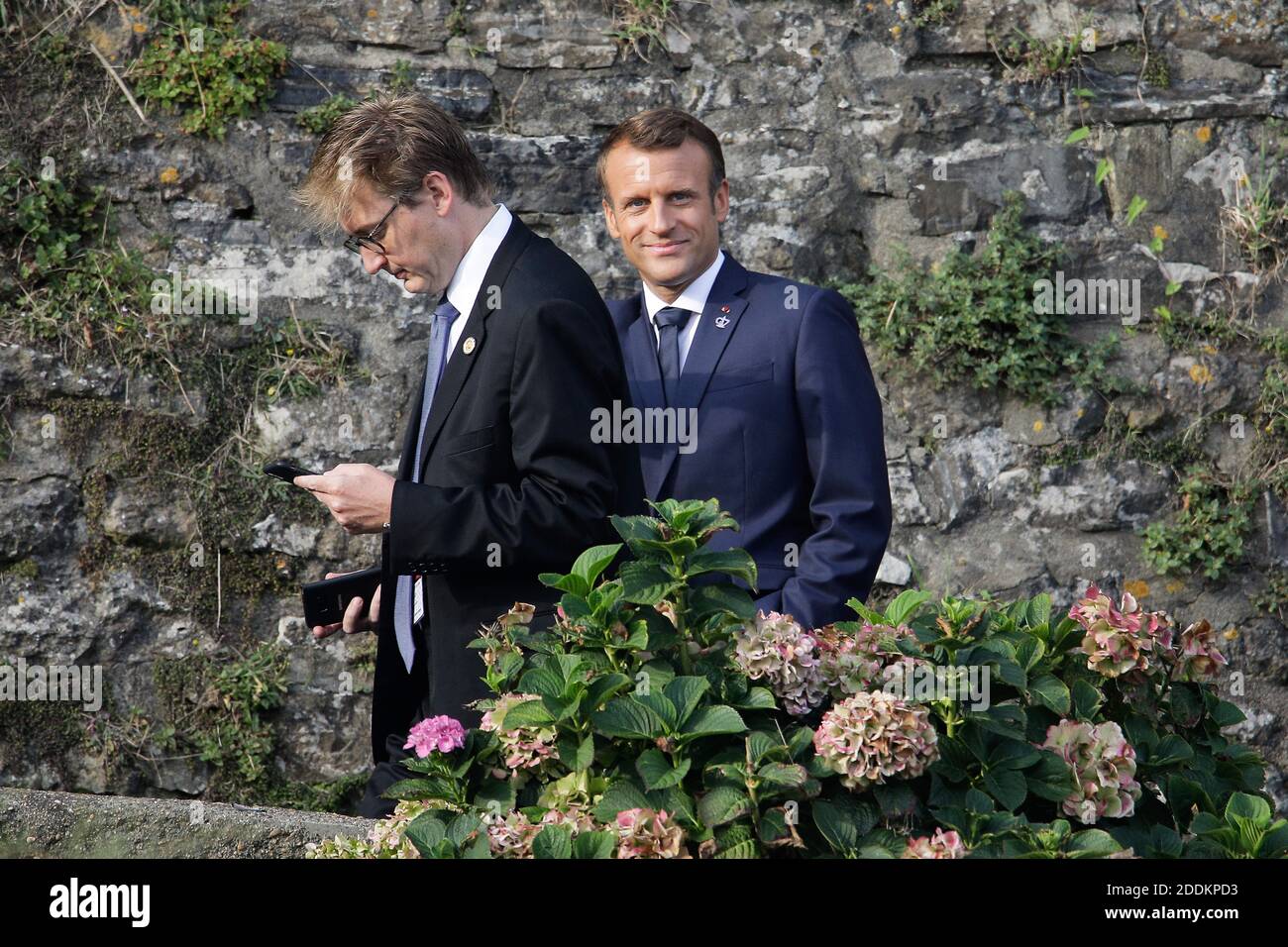 French President Emmanuel Macron walking in Biarritz, France, August 26 ...