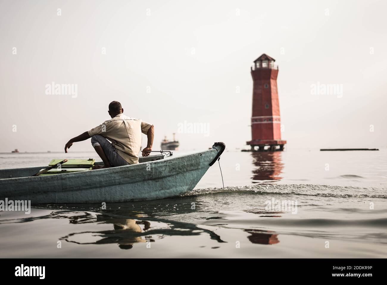 Hard working boatman Stock Photo - Alamy