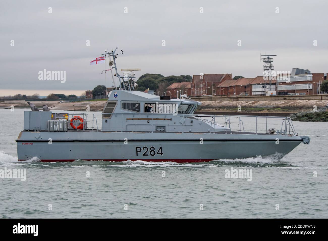 The Royal Navy fast patrol boat HMS Scimitar (P284) approaching ...