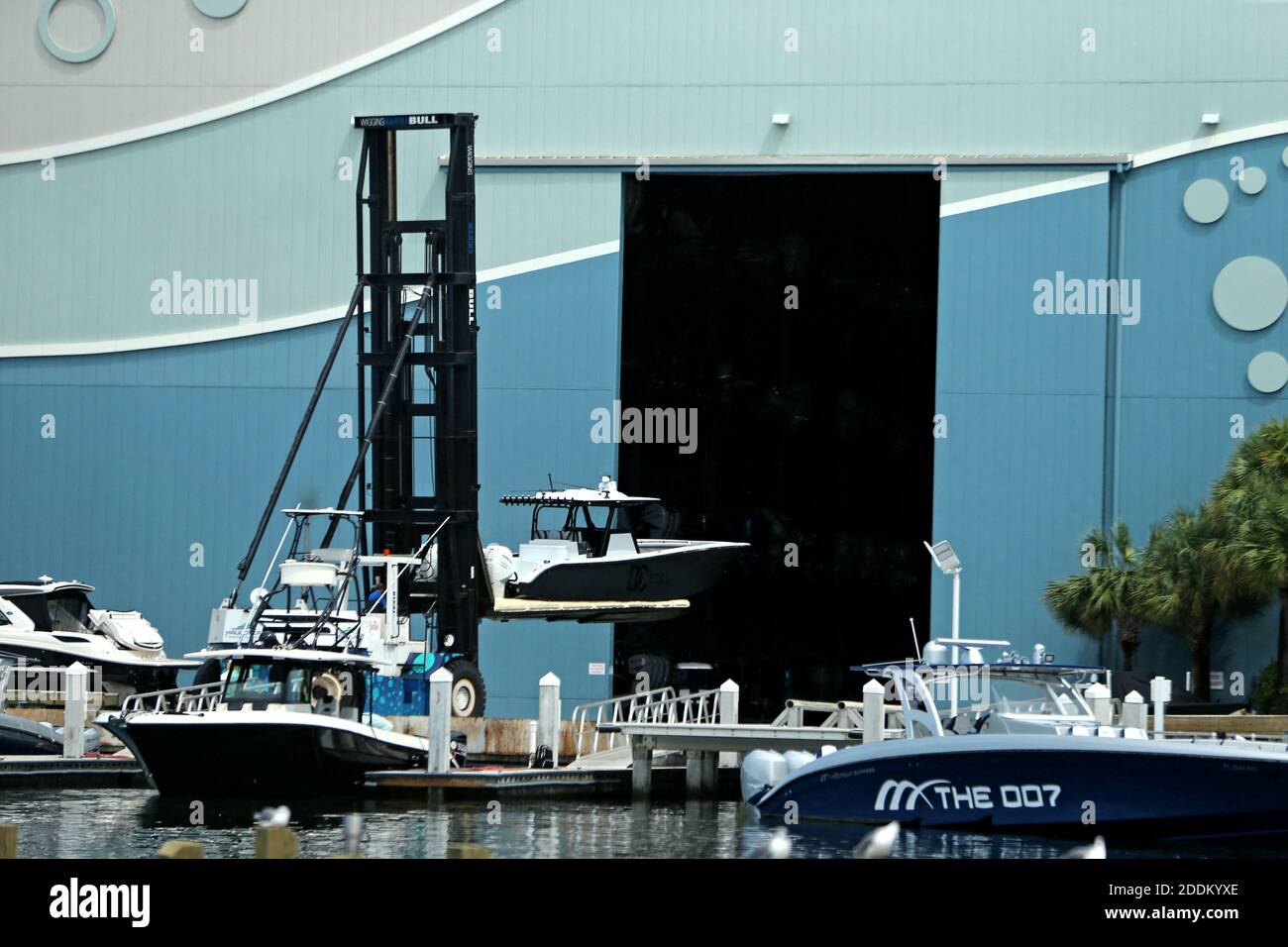 NO FILM, NO VIDEO, NO TV, NO DOCUMENTARY - People pulling their boats ...