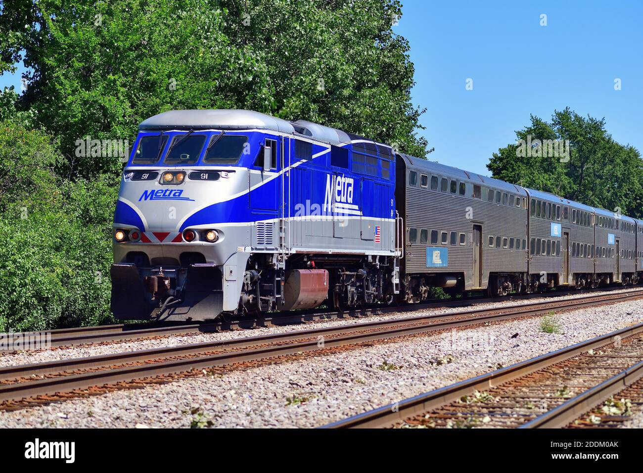 Chicago, Illinois, USA. An outbound Metra train transporting commuters ...