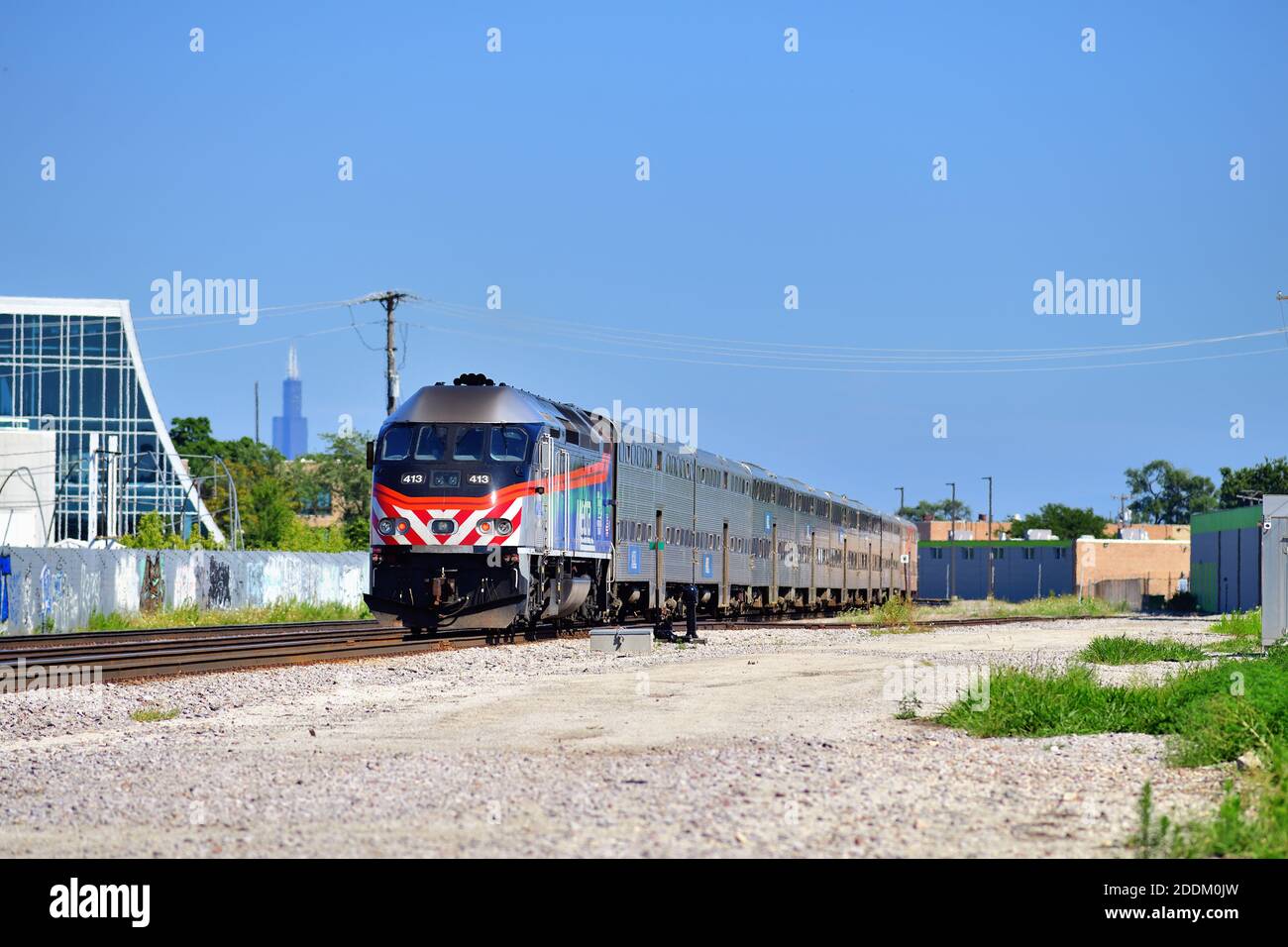 Chicago, Illinois, USA. An inbound Metra train transporting commuters ...